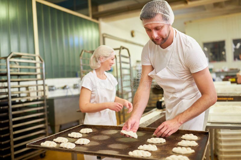 Young Baker`s Apprentice Baking Yeast Plaits Stock Photo - Image of ...
