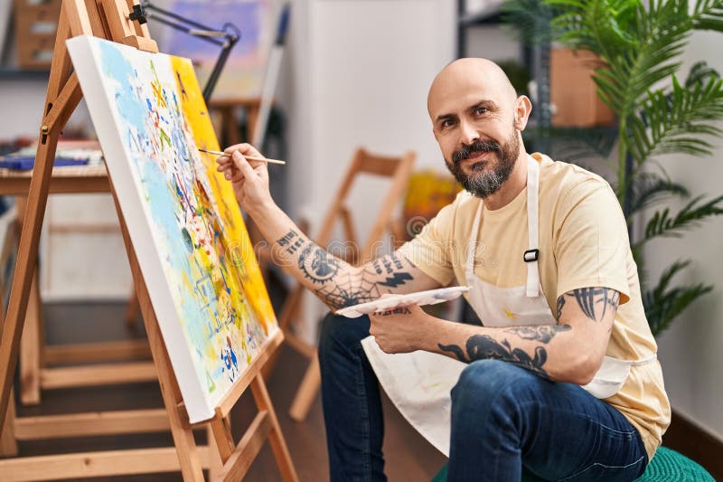 Young Bald Man Artist Smiling Confident Drawing at Art Studio Stock ...