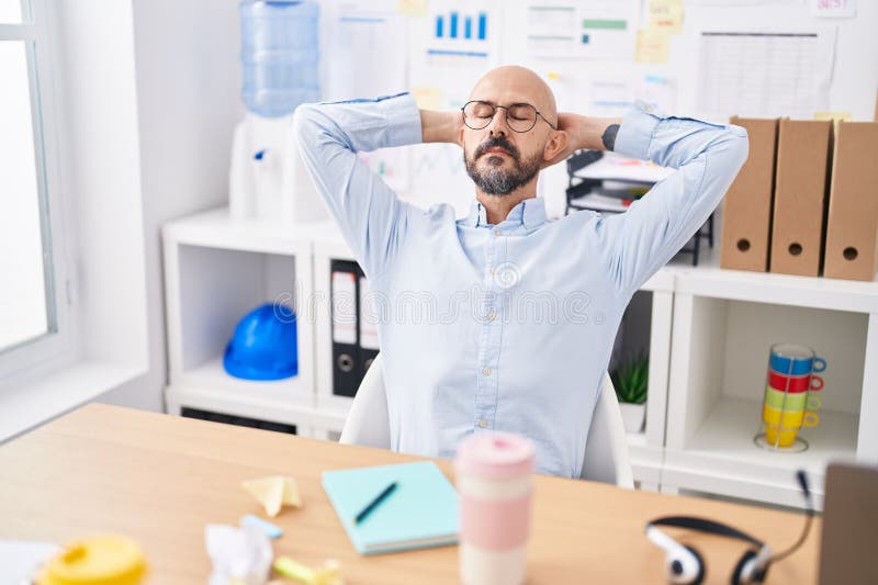 Young Bald Man Business Worker Relaxed with Hands on Head at Office ...