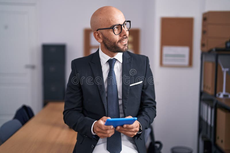 Young Bald Man Business Worker Smiling Confident Using Touchpad at ...