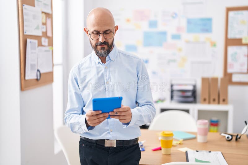 Young Bald Man Business Worker Using Touchpad at Office Stock Photo ...