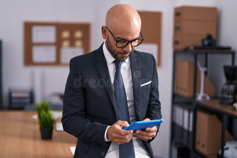 Young Bald Man Business Worker Using Touchpad at Office Stock Photo ...