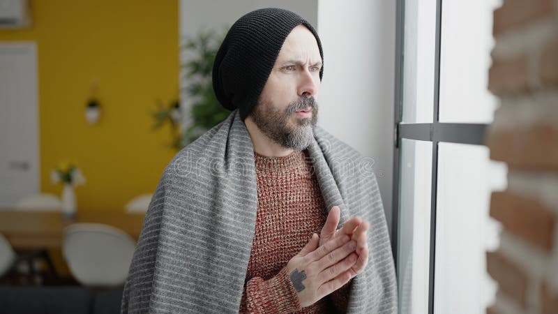 Young Bald Man Covering with Blanket Looking Throw the Window at Home ...