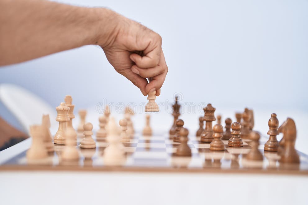 Young Bald Man Playing Chess Sitting on Table at Home Stock Photo ...