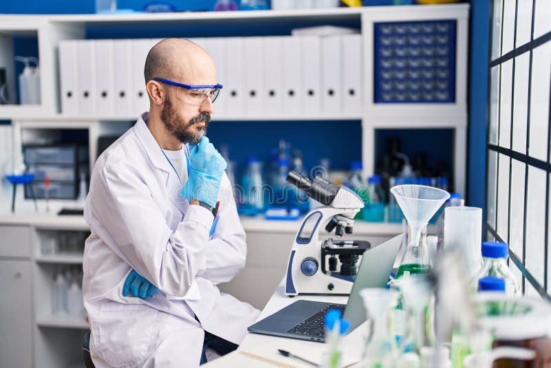 Young Bald Man Scientist Having Video Call at Laboratory Stock Image ...