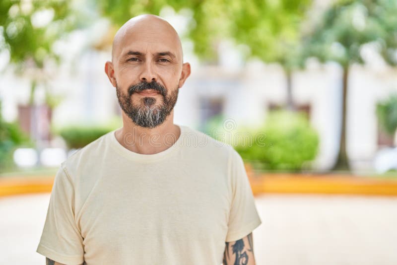 Young Bald Man Smiling Confident Standing at Park Stock Photo - Image ...