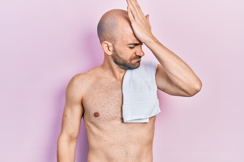 Young Bald Man Standing Shirtless Surprised with Hand on Head for ...