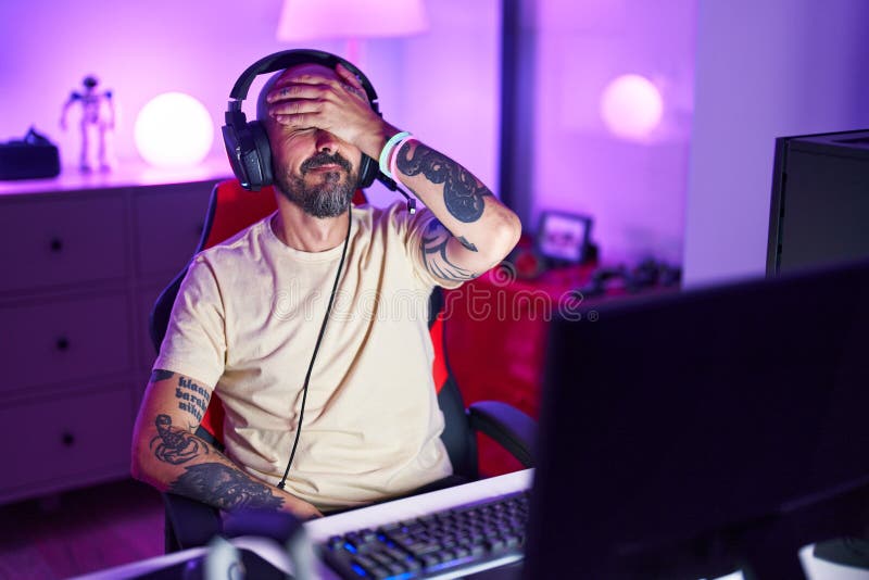 Young Bald Man Streamer Stressed Using Computer at Gaming Room Stock ...