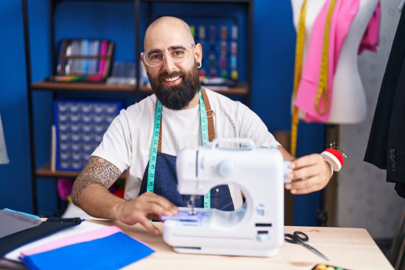 Young Bald Man Tailor Smiling Confident Using Sewing Machine at ...