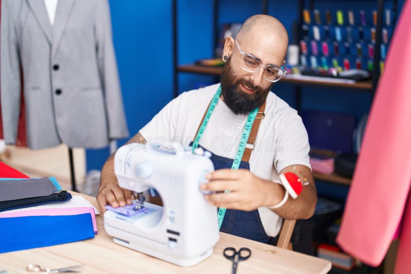 Young Bald Man Tailor Smiling Confident Using Sewing Machine at ...