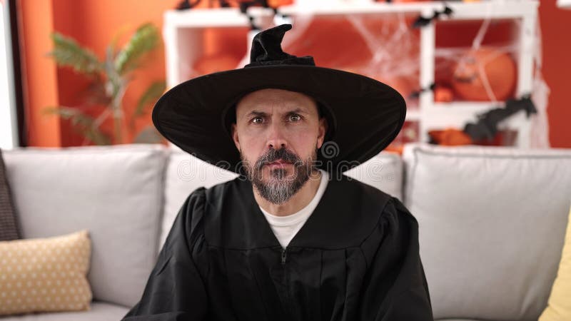 Young Bald Man Wearing Wizard Costume with Relaxed Expression at Home ...