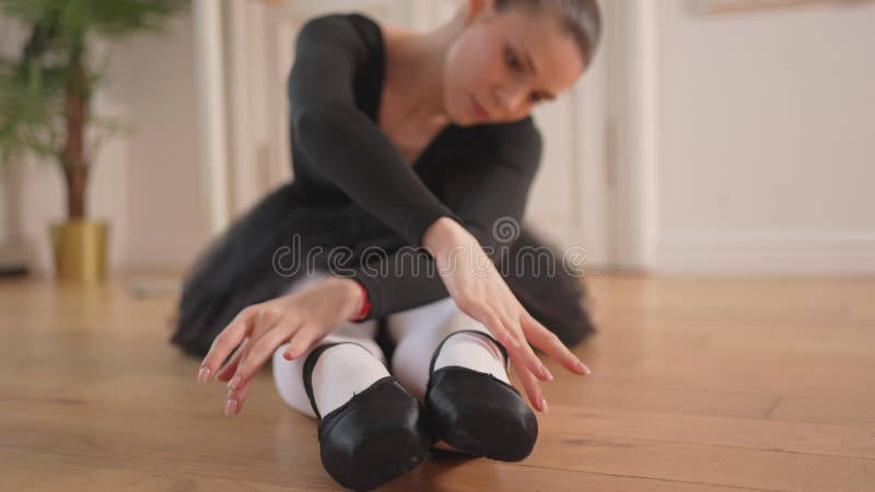 Young Ballerina in Tutu Skirt Stretching Practicing Ballet Positions ...