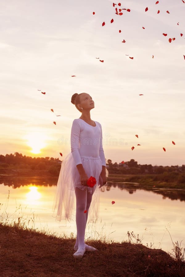 Young Ballet Dancer at Sunset Stock Image - Image of orange, beach ...