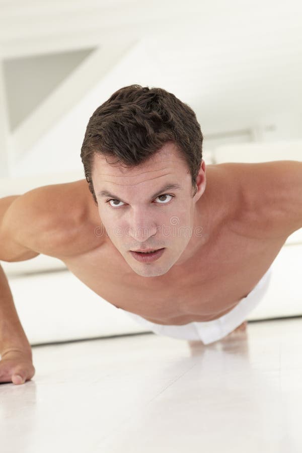 Young Bare Chested Man Exercising at Home Stock Image - Image of happy ...