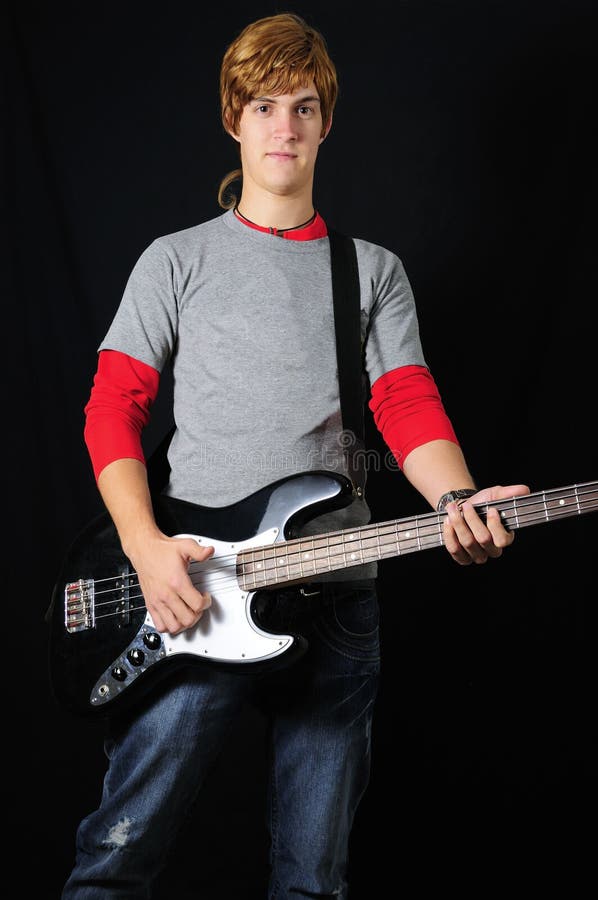 4+ Young man posing electric bass Free Stock Photos - StockFreeImages