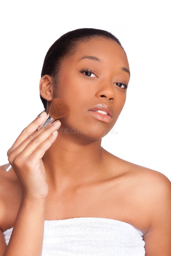 Young Beautiful African Woman Applying Makeup Stock Image - Image of ...