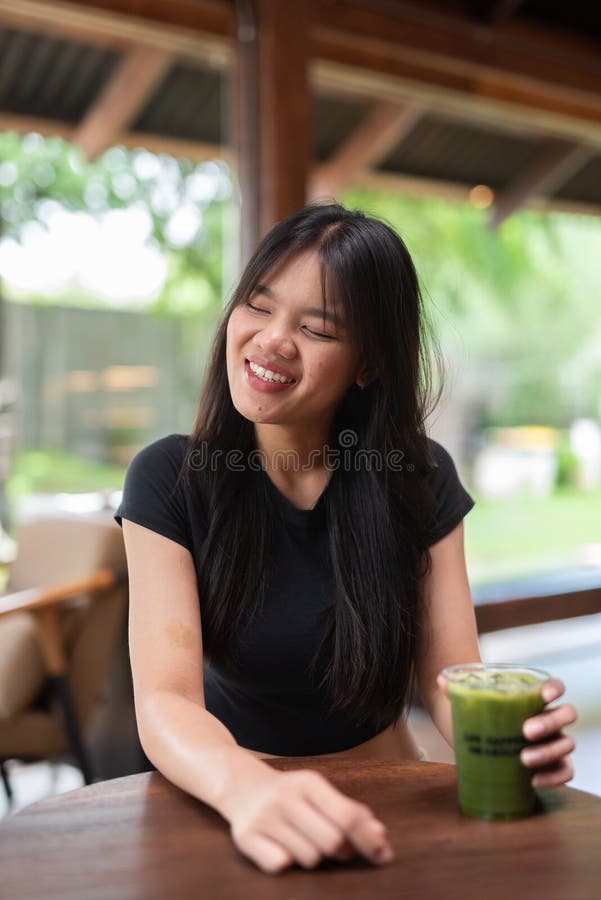 Young Beautiful Asian Woman in Cafe Stock Image - Image of indoors ...