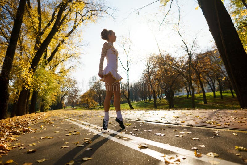 Young Beautiful Ballerina Dancing Outdoors in a Park. Ballet Project ...