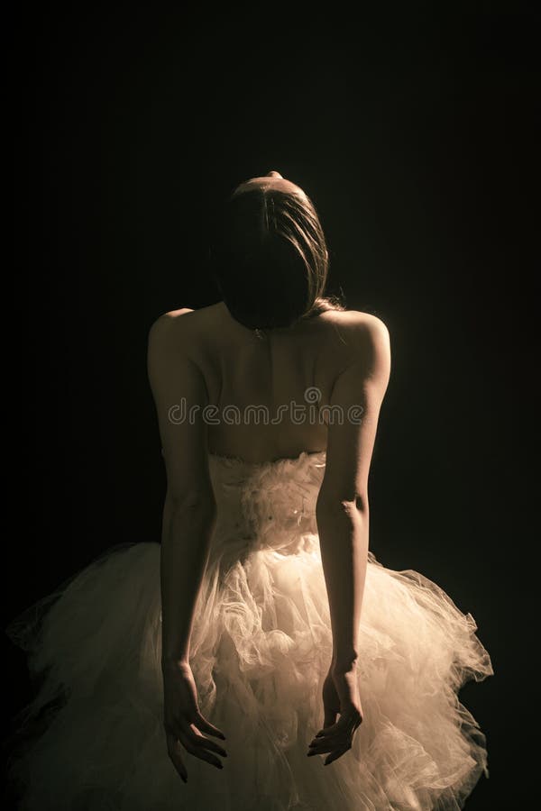 Young Beautiful Ballet Dancer is Posing in Studio, View Back. Stock ...