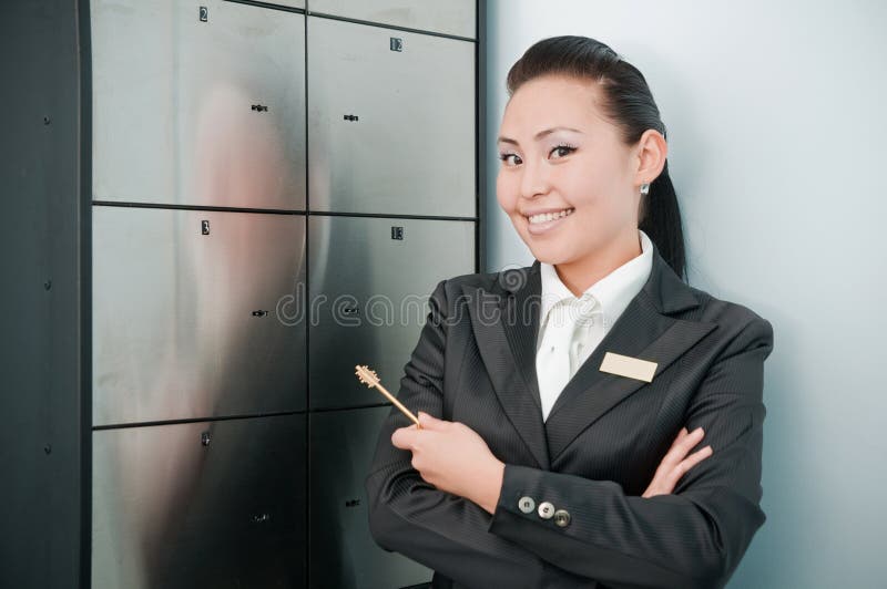 Bank worker by an ATM stock image. Image of happy, lady - 65977753