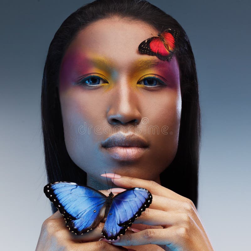 Young and Beautiful Black Model Exotic Look with Bright Blue Butterfly ...