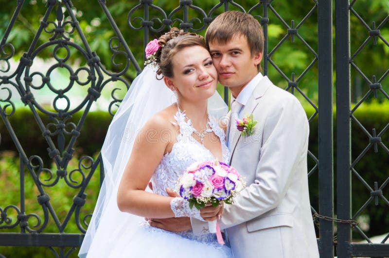 Young and Beautiful Bride and Groom Smiling at Eac Stock Photo - Image ...