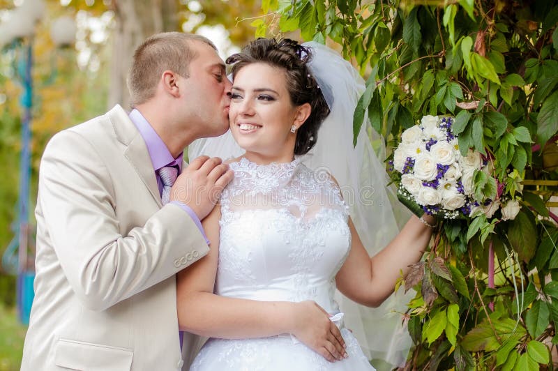 Young and Beautiful Bride and Groom Stock Image - Image of laughing ...