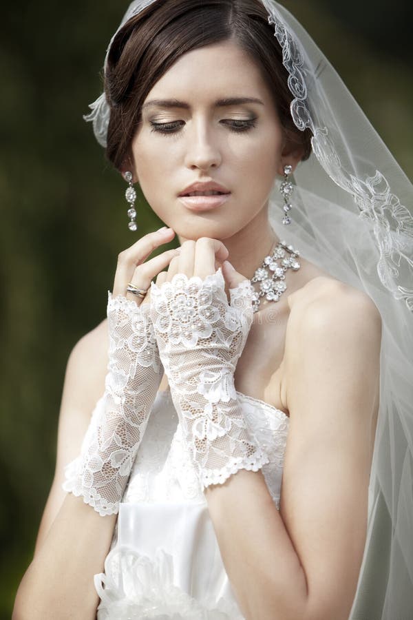 Young Beautiful Bride Outdoors Stock Photo - Image of woman, gown: 32619072