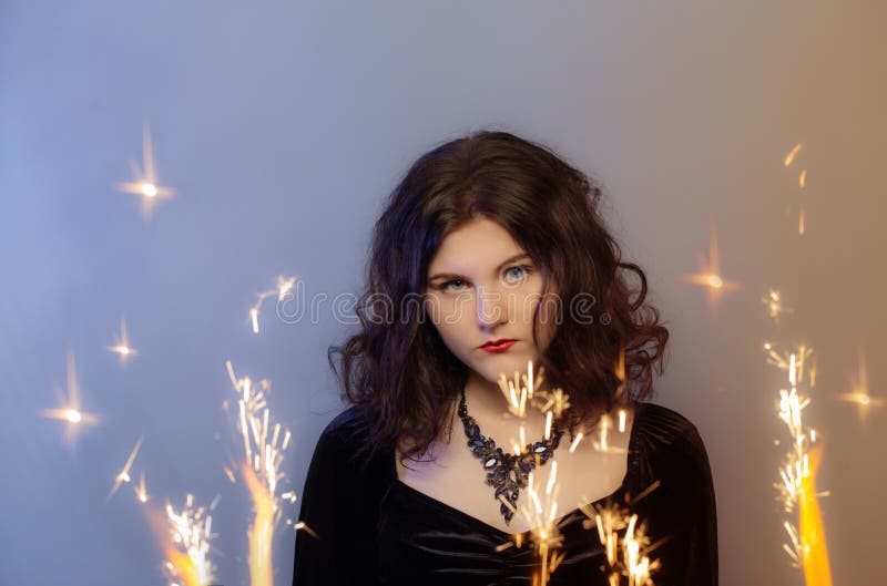 Beautiful Brunette Witch with Fire and Sparks Stock Photo - Image of ...
