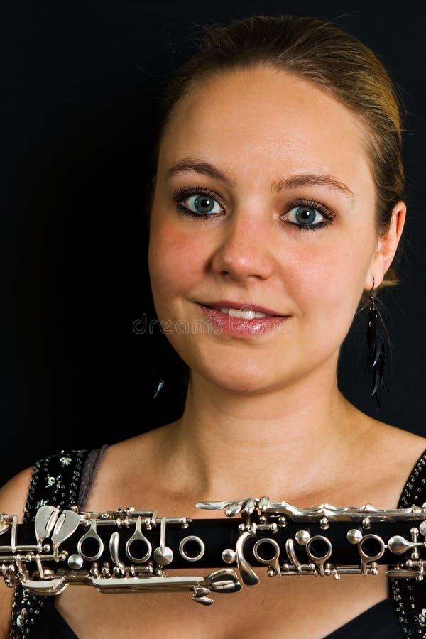 Young Beautiful Clarinetist Stock Photo - Image of dress, portrait ...