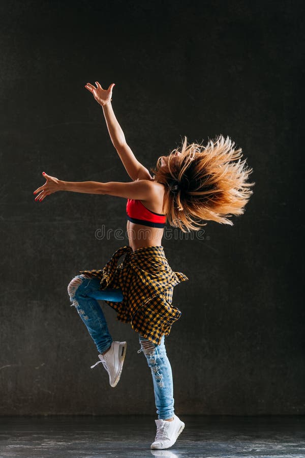 Young Beautiful Female Dancer is Posing in the Studio Stock Image ...