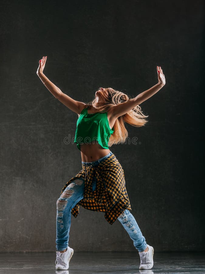 Young Beautiful Female Dancer is Posing in the Studio Stock Image ...