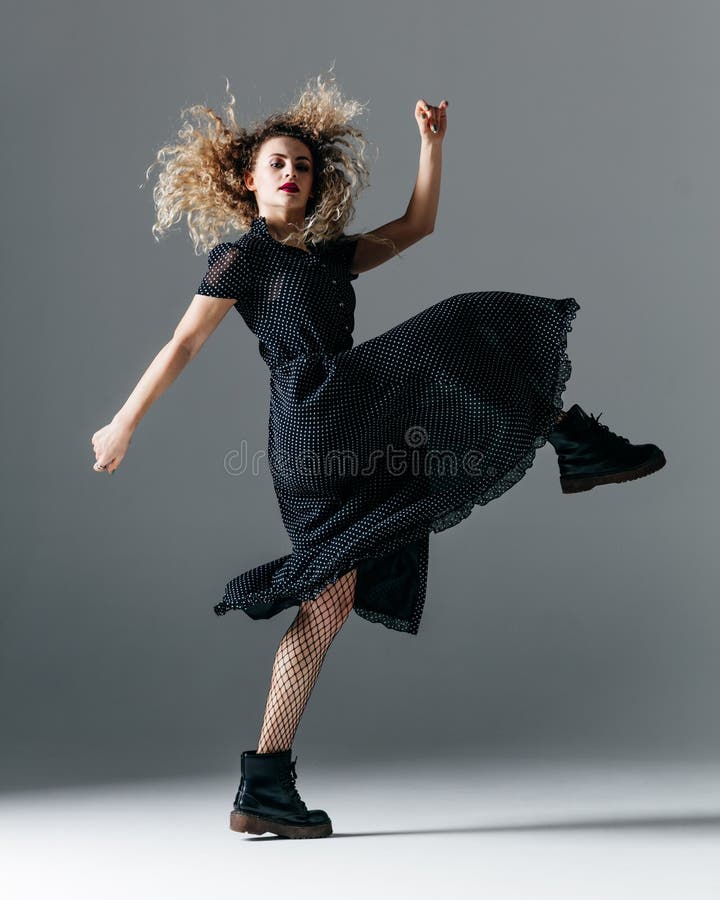 Young Beautiful Female Dancer is Posing in the Studio Stock Photo ...
