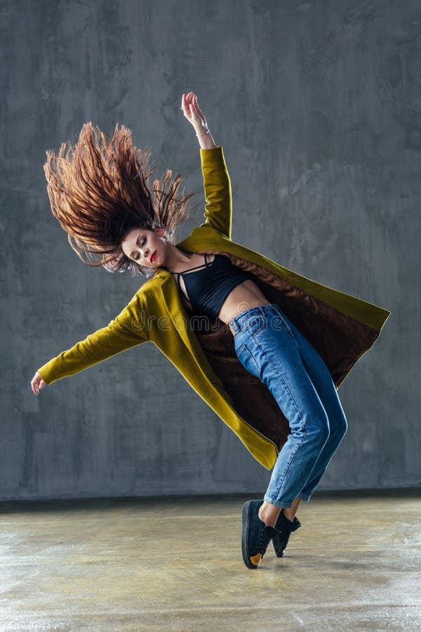 Young Beautiful Female Dancer is Posing in the Studio Stock Image ...