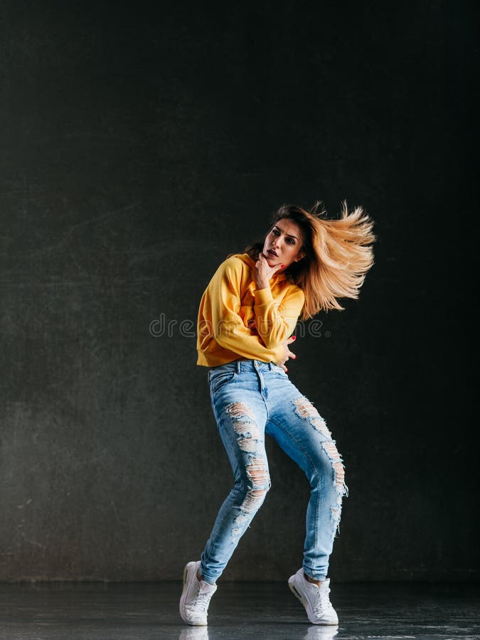 Young Beautiful Female Dancer is Posing in the Studio Stock Image ...