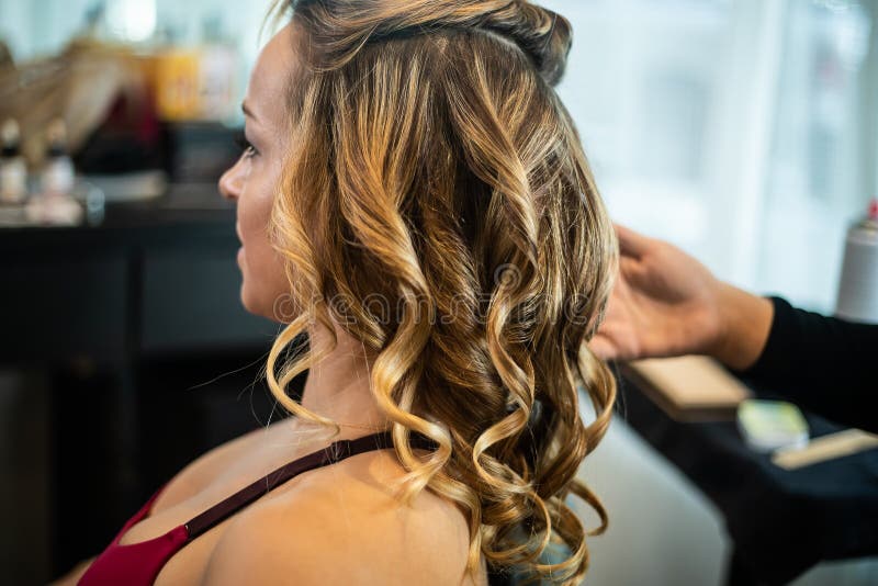 Young Beautiful Female Getting Hair Curled Stock Image - Image of ...