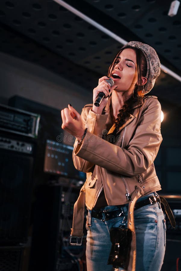Young Beautiful Female Singer Rehearsing in a Recording Studio Stock ...