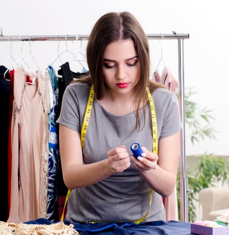 Young Beautiful Female Tailor Taking Measurements Stock Photo - Image ...