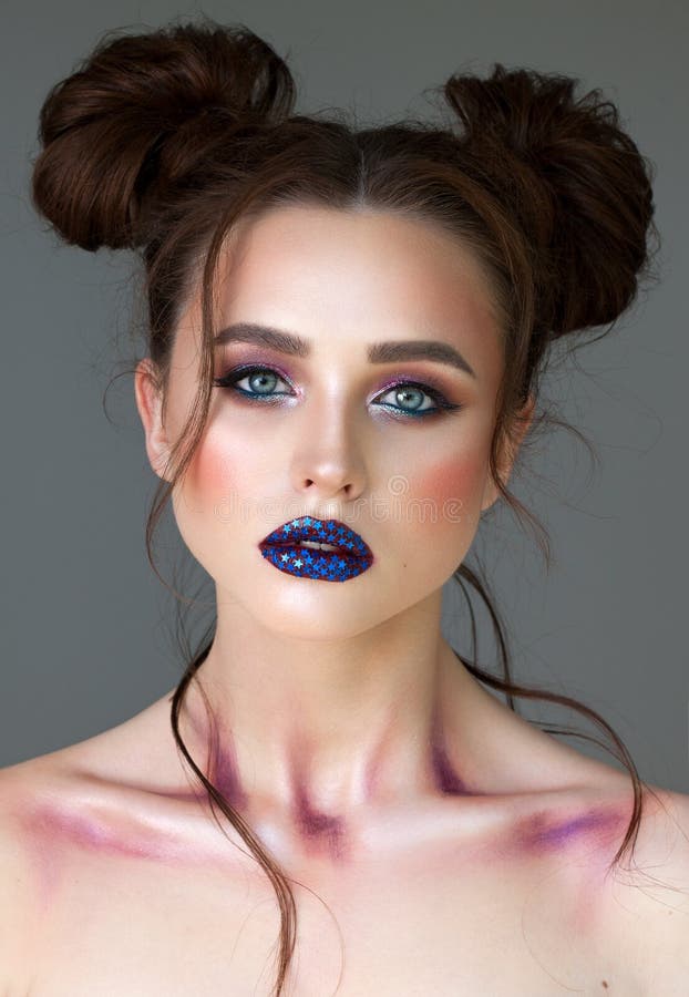 Young Beautiful Model With A Bright Blue Eyes Fashion Make Up Perfect