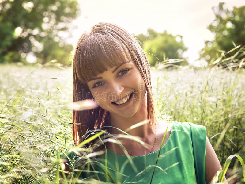 Young Beautiful Girl Lying on the Grass Stock Image - Image of grass ...