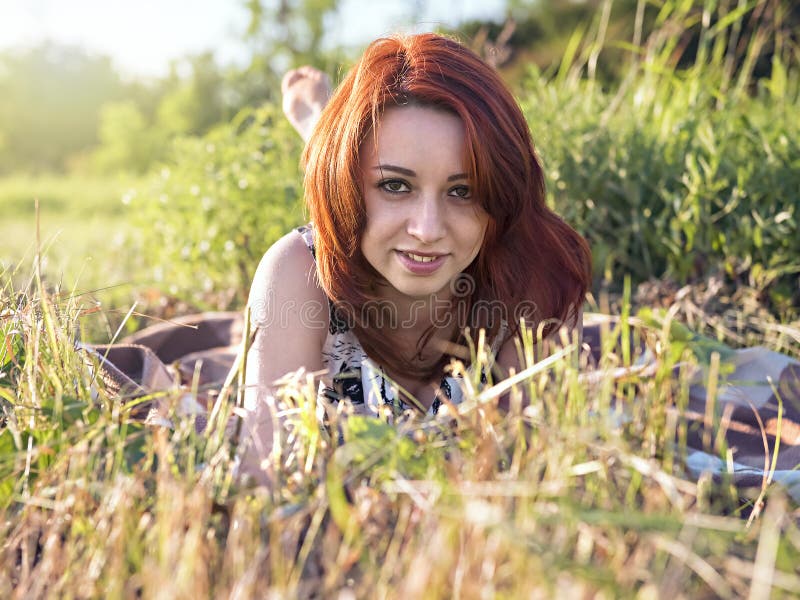 Young Beautiful Girl Lying on the Grass Stock Image - Image of leisure ...