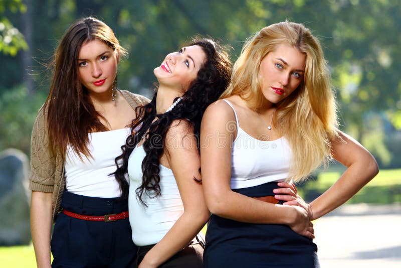 Young and Beautiful Girlfriends Have Fun in Park Stock Image - Image of ...