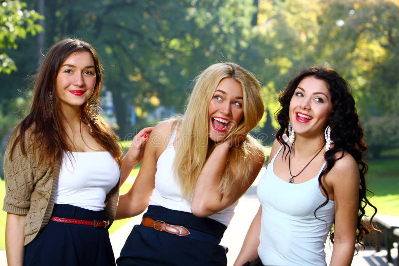 Young and Beautiful Girlfriends Have Fun in Park Stock Image - Image of ...