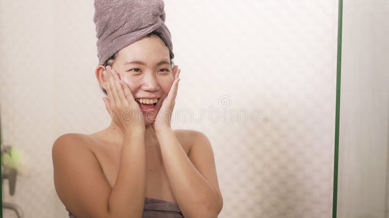 Young Beautiful And Happy Asian Chinese Woman With Head Wrapped In