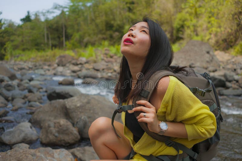 Young Beautiful And Happy Asian Japanese Woman Carrying Backpack