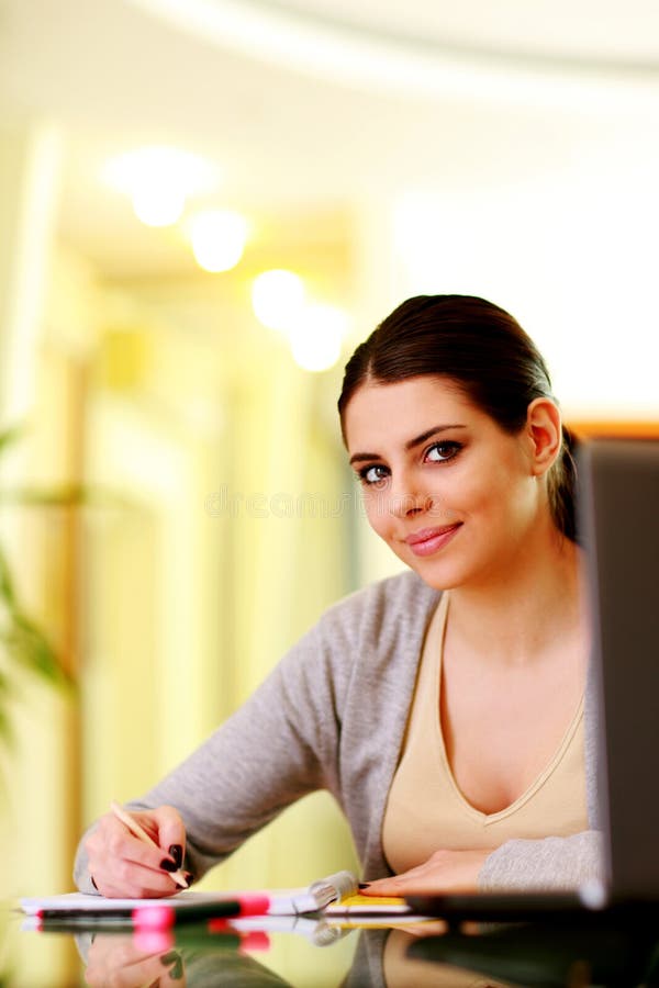 Young Beautiful Happy Woman Writing Notes Stock Image - Image of ...
