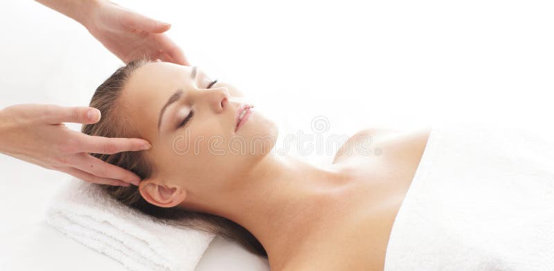 Young Beautiful And Healthy Woman In Spa Salon Traditional Massage