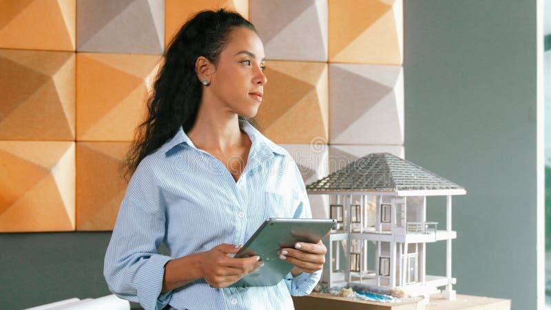 Hispanic Architect Drawing Building Construction by Using Tablet ...