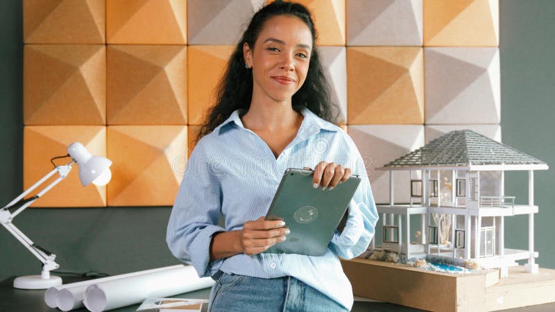 Hispanic Architect Drawing Building Construction by Using Tablet ...