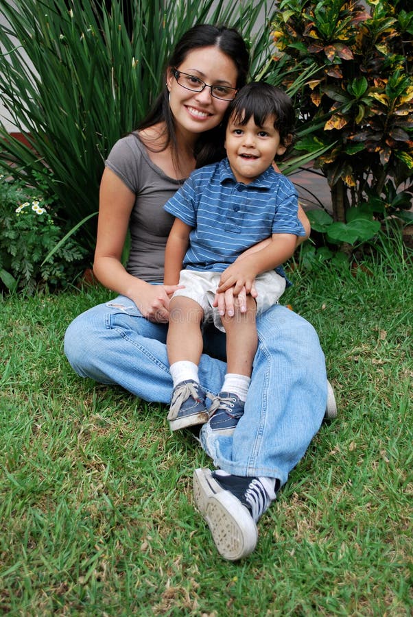 Hispanic Mother & Two Boy Children Family On Beach Stock Image - Image ...